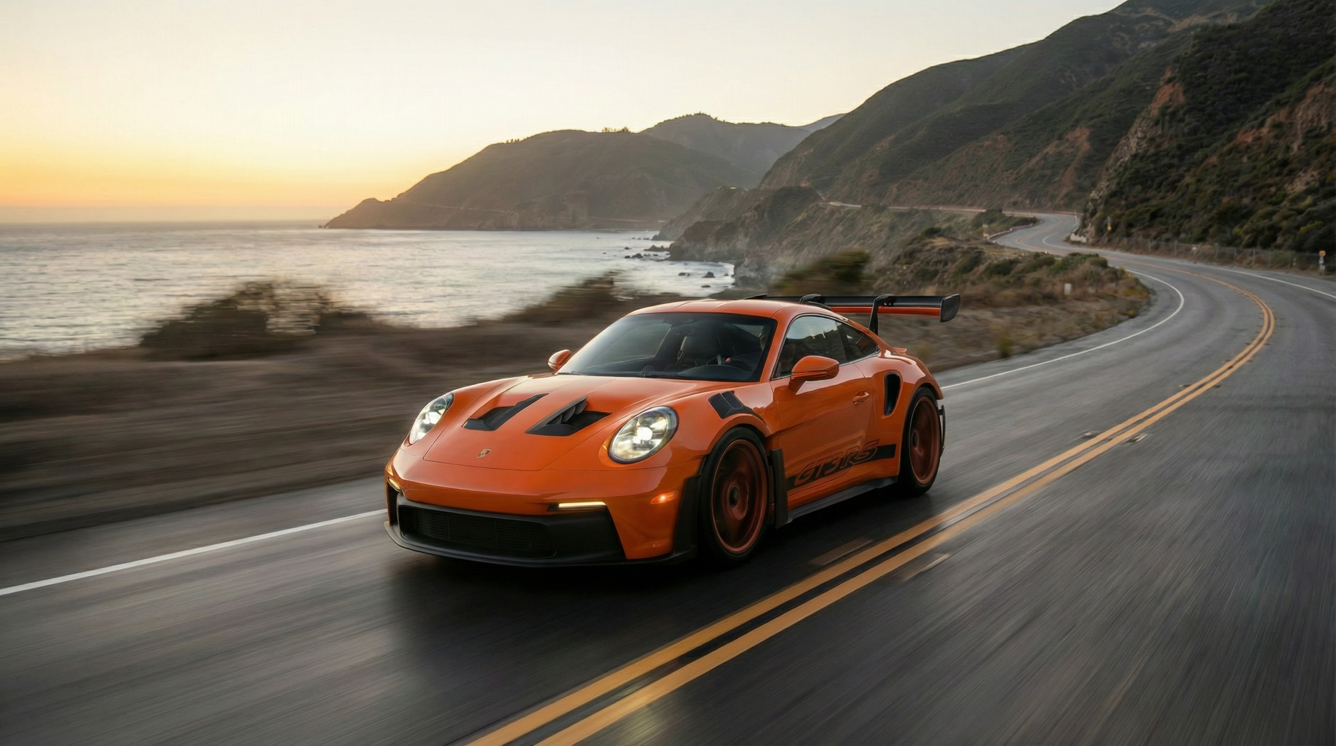 Porsche 911 GT3 RS orange paysage | Fond d'écran 4k
